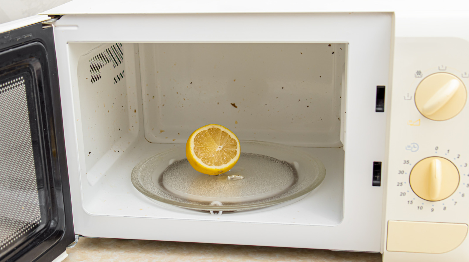 Cleaning Your Microwave Is Easier With One Lemon Trick