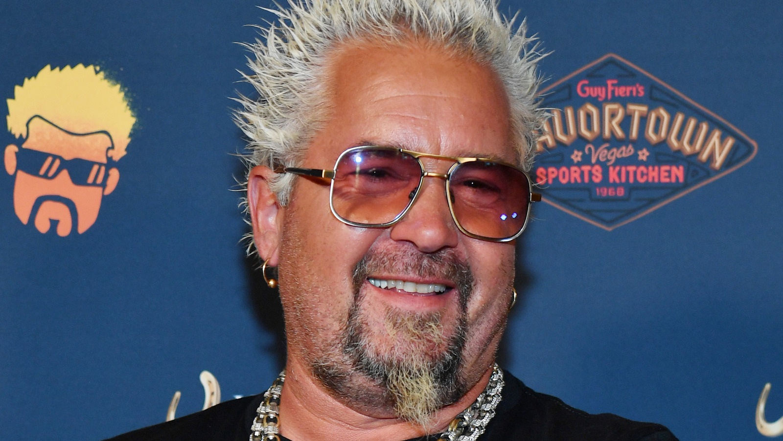 Guy Fieri's Number One Tip For Building A Not-Boring Party Menu